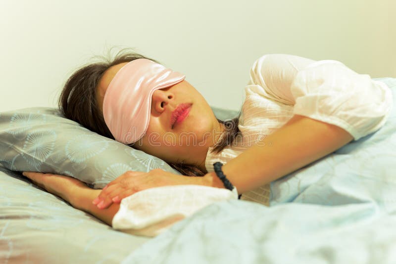 Woman Sleeping on Bed with Eye Mask on. Stock Photo - Image of peaceful ...