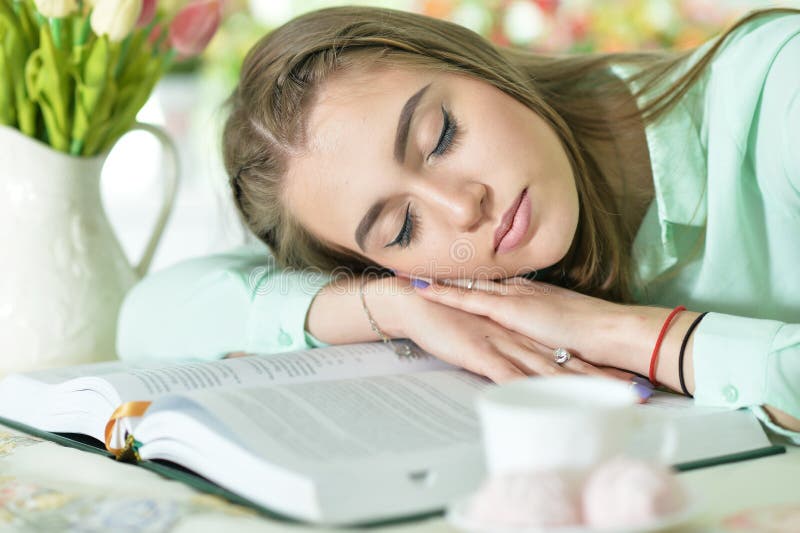 Woman sleeping on book stock image. Image of lifestyle - 96910609