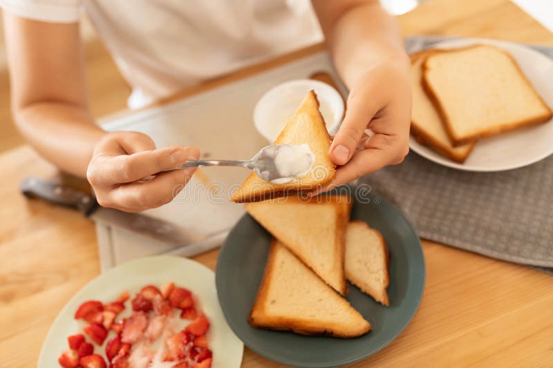 The Woman Sliced the Fried Toast into Triangles Stock Photo - Image of ...