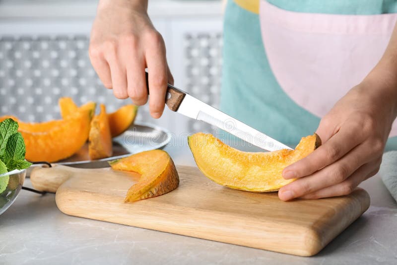 Woman Slicing Fresh Ripe Melon Stock Photo - Image of juicy, delicious ...
