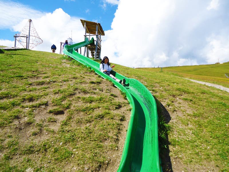 Woman on the slide stock photo. Image of curve, person - 63280600