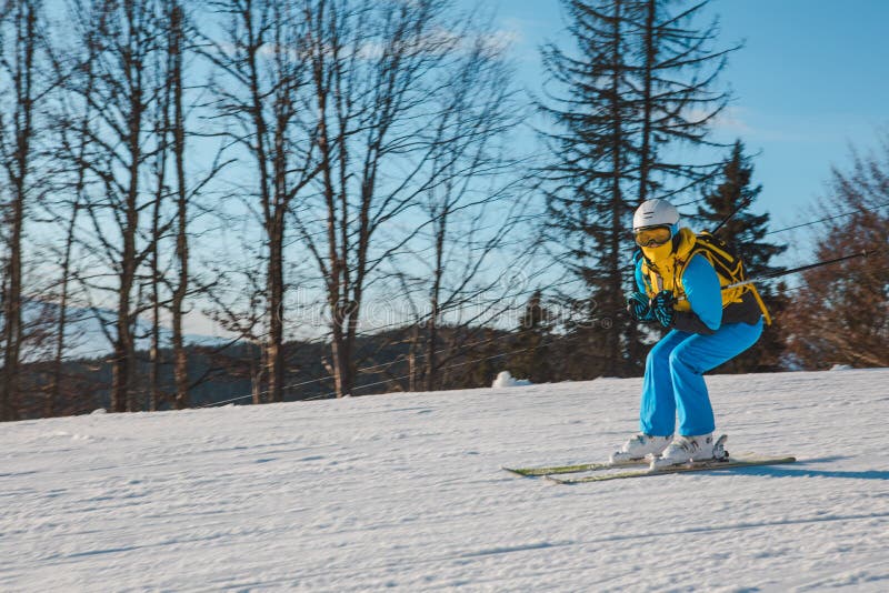 Woman Sliding Down by Slope on Skies Stock Photo - Image of happiness ...