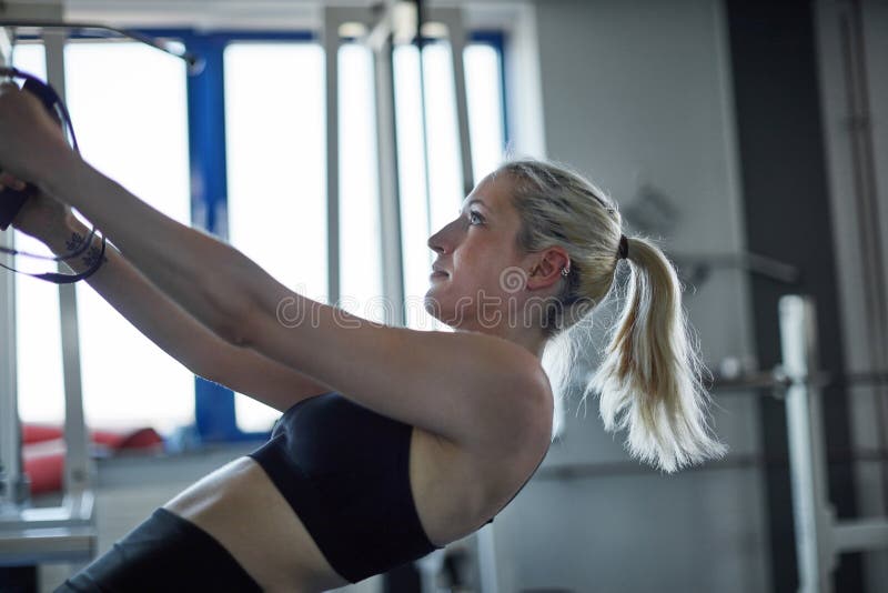 Woman in Sling Training As a Healthy Back Training Stock Image - Image ...