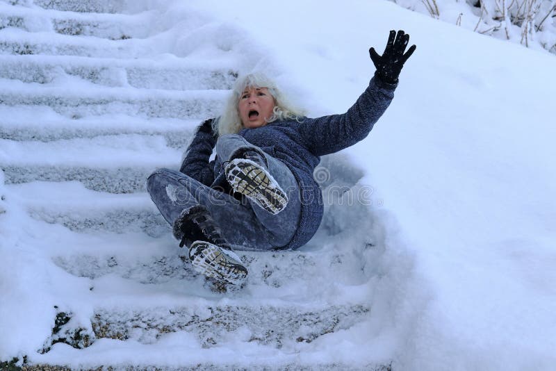 A Woman Slipped and Fell on a Wintry Staircase Stock Image - Image of ...