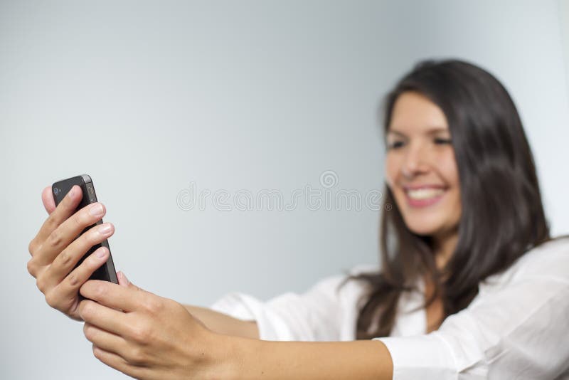 Woman with smartphone stock photo. Image of success, employee - 33241630