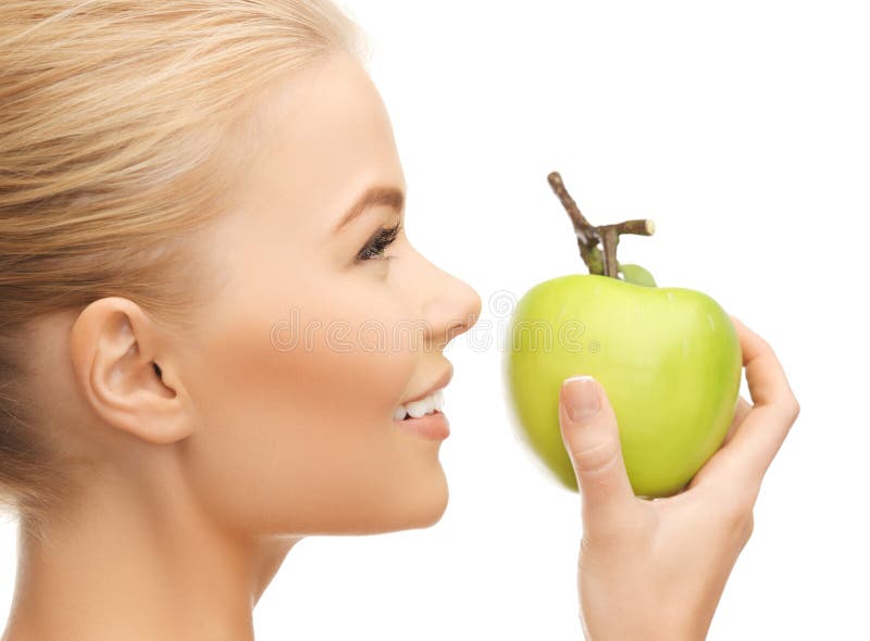 Woman smelling apple stock photo. Image of european, diet - 30835408