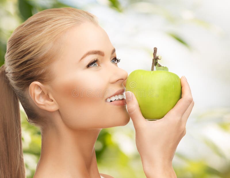 Woman smelling apple stock image. Image of hand, happy - 38099539