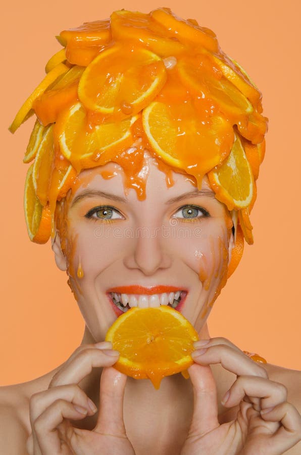 Woman with Smile Eats Slice of Orange Stock Image - Image of headgear ...
