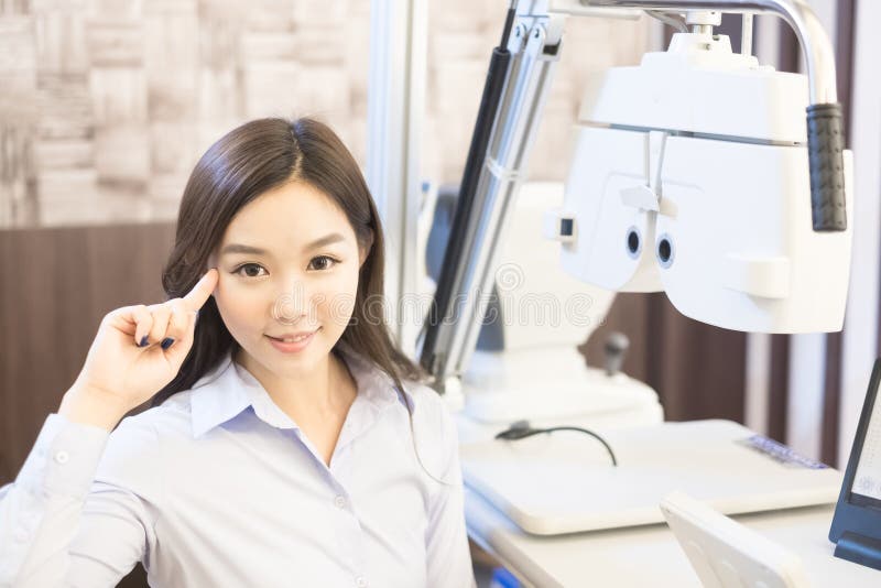 Chinese Businesswoman with Glasses with Eyesight Test Chart Over Stock ...