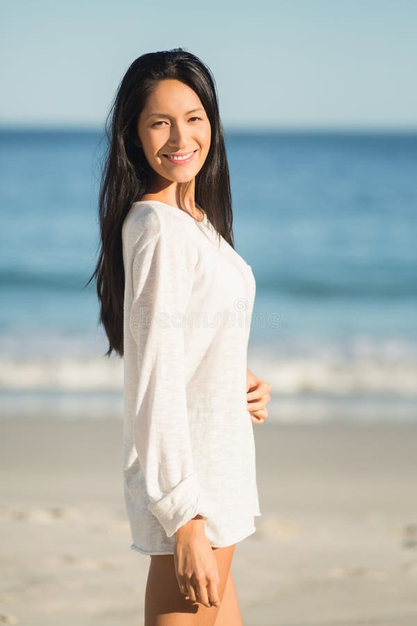 Woman smiling on beach stock image. Image of adult, camera - 77874471