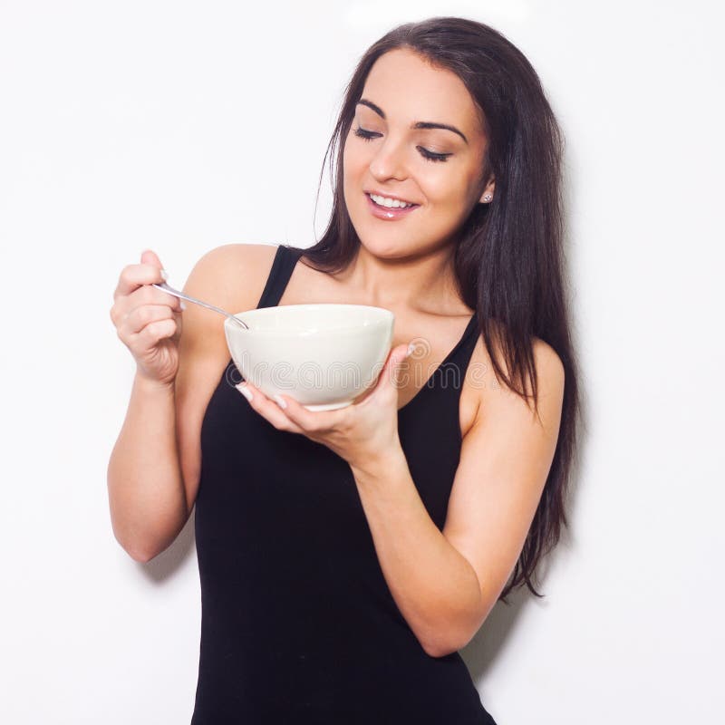 Woman Smiling while Holding a Bowl. Stock Photo - Image of female ...