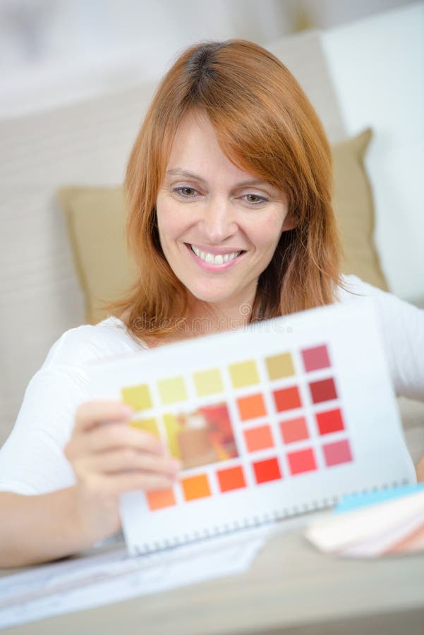 Woman Smiling Holding Color Page Stock Image - Image of creative ...