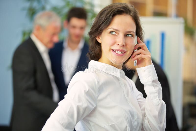 Woman is Smiling on the Phone with Her Smartphone Stock Photo - Image ...