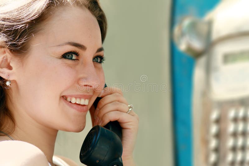 Woman smiling in telephone stock image. Image of sensual - 31248545