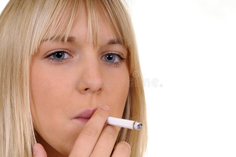 Woman smoking a cigarette stock photo. Image of girl - 16050428