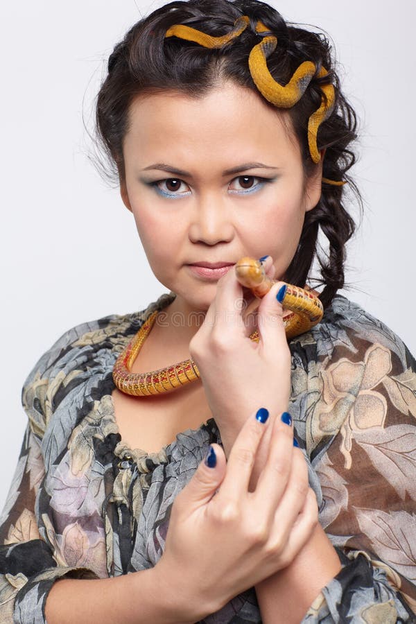 Woman with snake stock photo. Image of hairdo, gray, brunette - 20950398