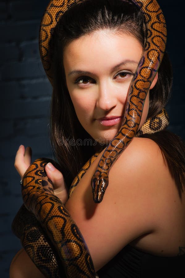 Woman and snake stock photo. Image of holding, hold, beauty - 39057818