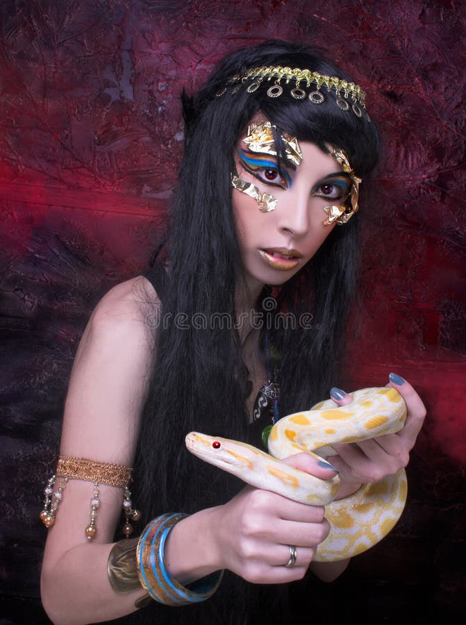 Woman with snake. stock image. Image of golden, luxury - 39878667