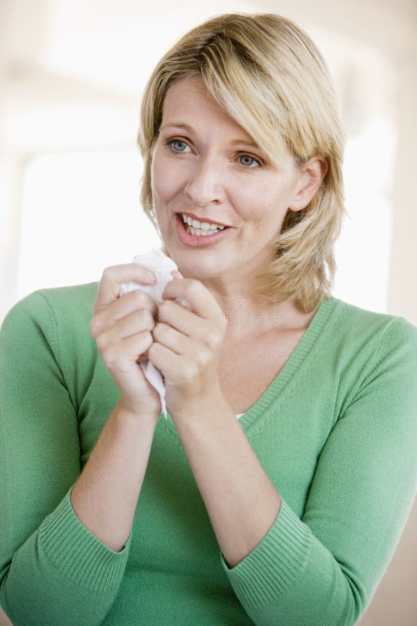 Woman Sneezing stock photo. Image of indoors, handkerchief - 7772694