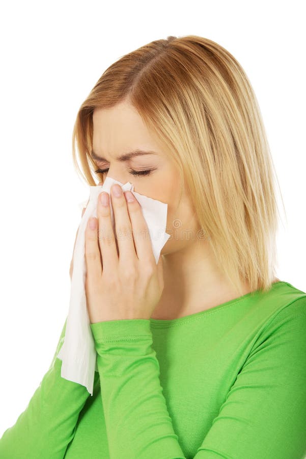 Woman sneezing to tissue. stock photo. Image of allergy - 53917608