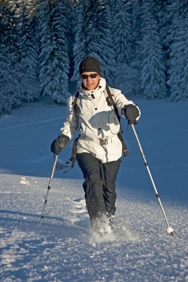 Woman in the snow stock image. Image of determination - 3880109