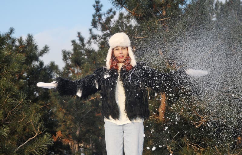 Woman Has Fun with a Snow in Forest Stock Image - Image of cheerful ...