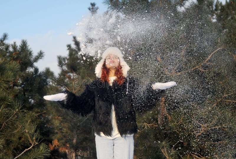 Woman Has Fun with a Snow in Forest Stock Photo - Image of attractive ...