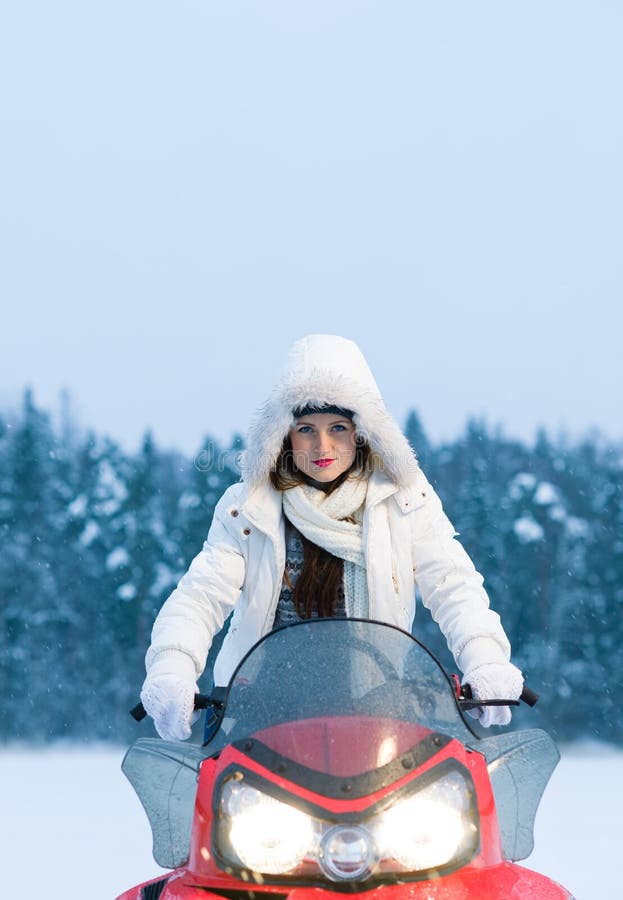 Woman and snowmobile stock photo. Image of leisure, headlights - 29609280