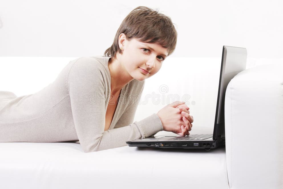 Woman on Sofa with Computer Stock Photo - Image of sofa, computer: 12654254