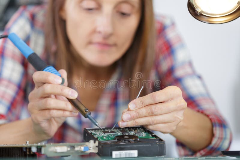 Woman Soldering Circuit Board Stock Image - Image of labcoat ...