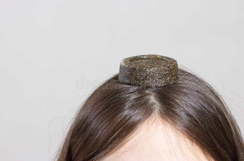 A Woman and a Solid Shampoo with Natural Makeup. Eco-friendly Soap ...