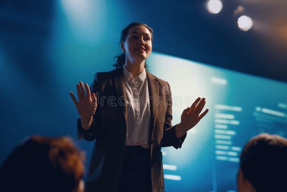 A Woman is Speaking on Stage Stock Image - Image of computer, business ...