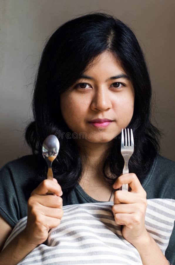 Woman with spoon and fork stock photo. Image of good - 43226728