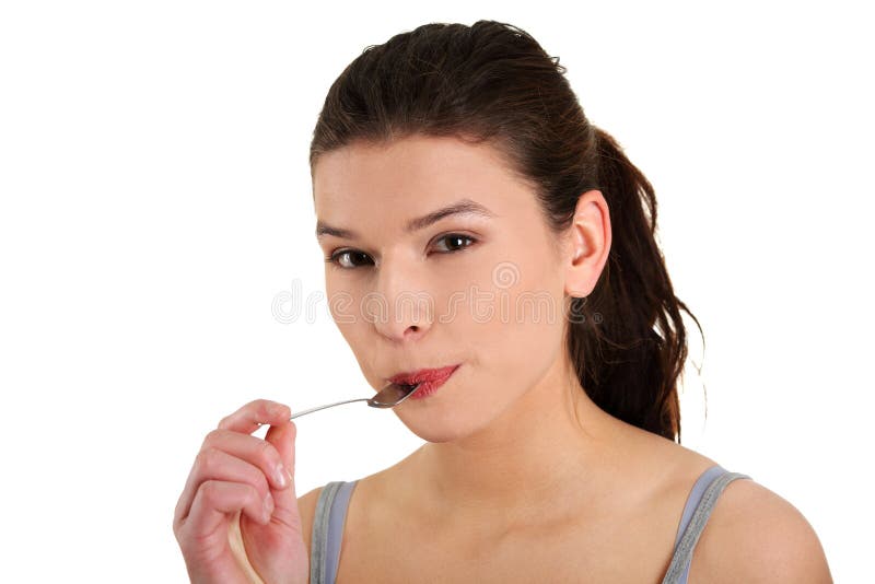 Woman with Spoon in Her Mouth Stock Photo - Image of girl, pretty: 22381754