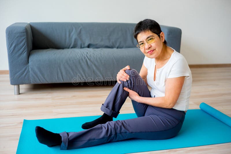 Woman sprained her leg stock image. Image of patient - 97496339