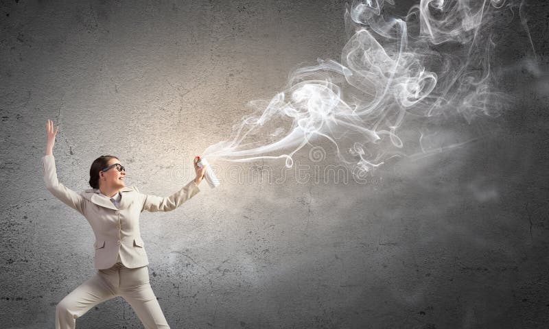 Woman with spray can stock photo. Image of businesswoman - 63600278