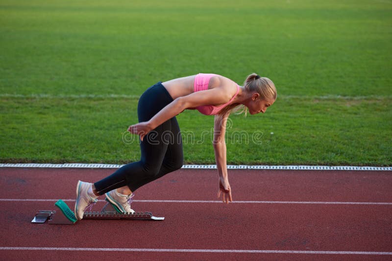 Woman Sprinter Leaving Starting Blocks Stock Image - Image of freedom ...