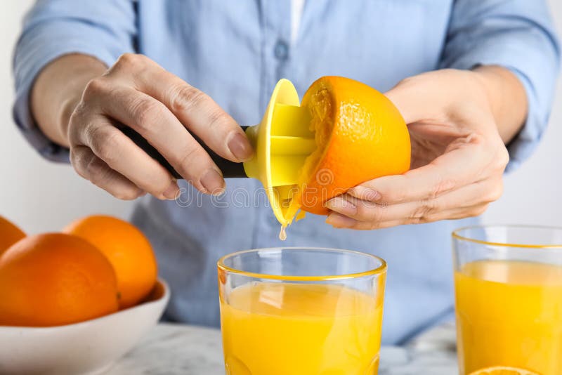 453 Woman Squeezing Orange Juice Stock Photos - Free & Royalty-Free Stock Photos from Dreamstime