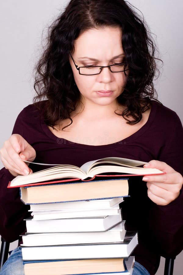 Woman with stack of books stock image. Image of boring - 16897173