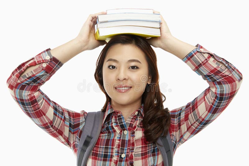 Woman with a Stack of Books on Her Head Stock Photo - Image of color ...