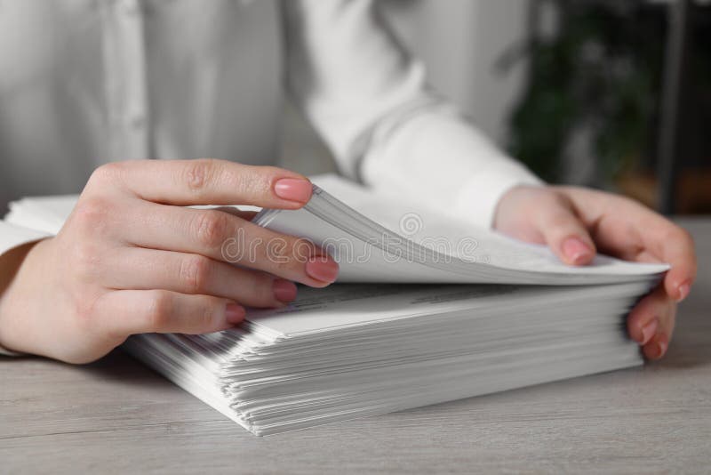 Woman Stacking Documents at Table in Office, Closeup Stock Image ...