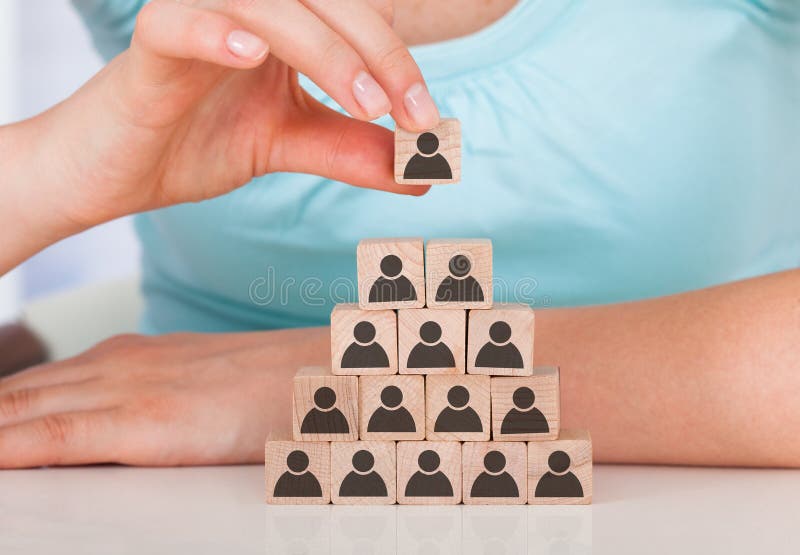 Woman Stacking Wooden Team Blocks at Table Stock Image - Image of ...