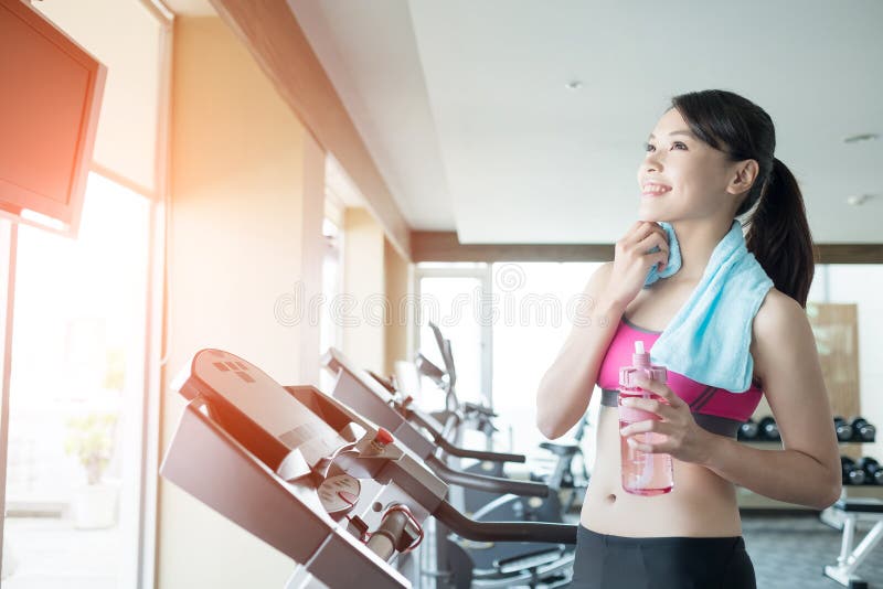 Woman stand on treadmill stock image. Image of athletic - 91159737