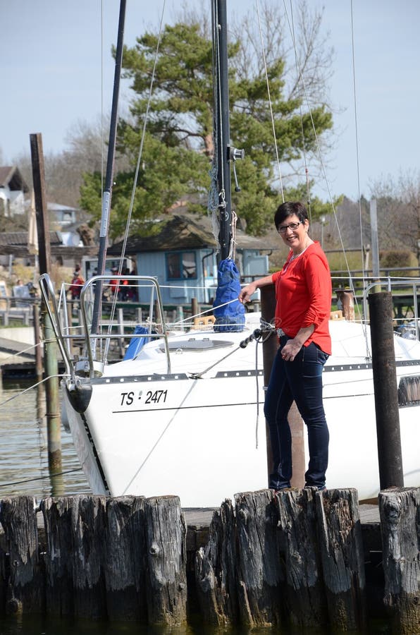Woman Standing at a Boat at Lake Chiemsee Stock Image - Image of ...