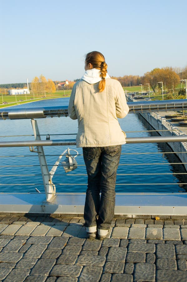 Woman Standing on the Bridge Stock Image - Image of portrait, woman ...