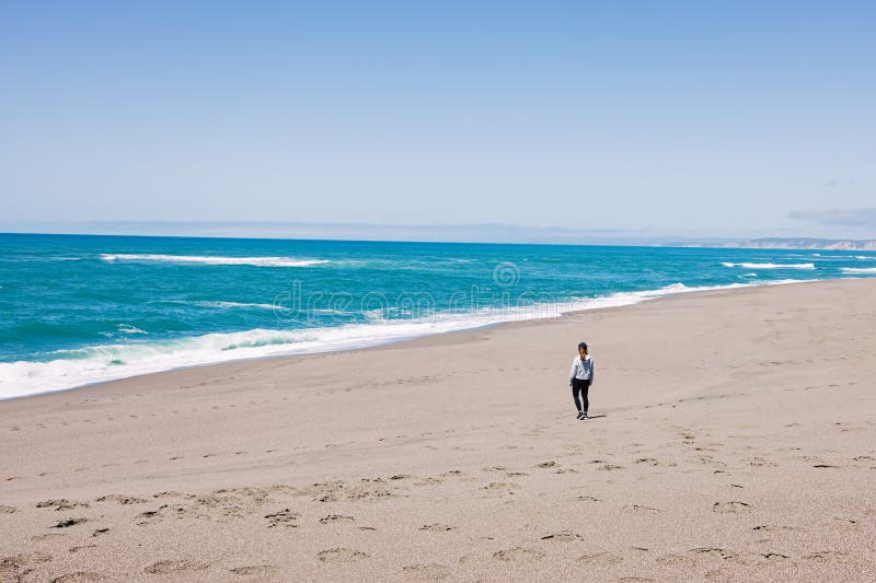 Woman Standing on the Empty Ocean Coast Stock Image - Image of ...