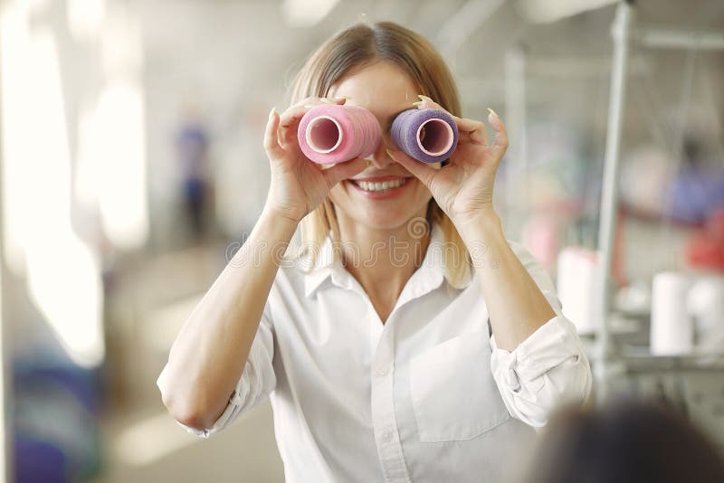 Woman Standing in the Factory with a Thread Stock Photo - Image of ...