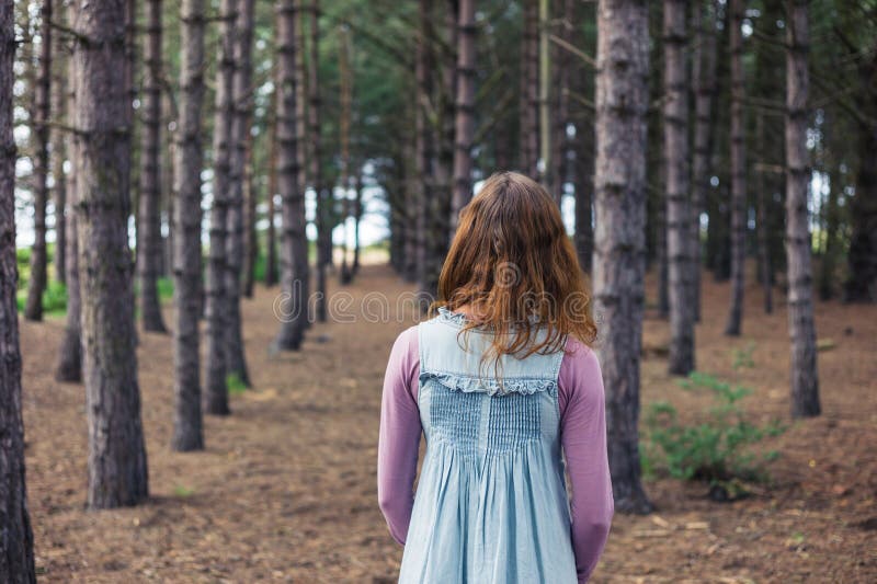 Woman Standing in Forest and Looking at Trees Stock Image - Image of ...