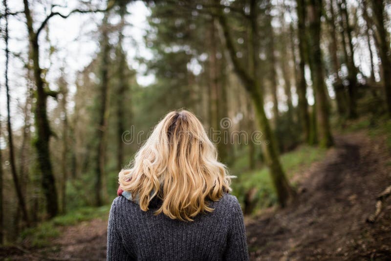 Woman standing in forest stock image. Image of standing - 77867857