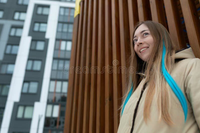 Woman Standing in Front of Tall Building Stock Photo - Image of ...